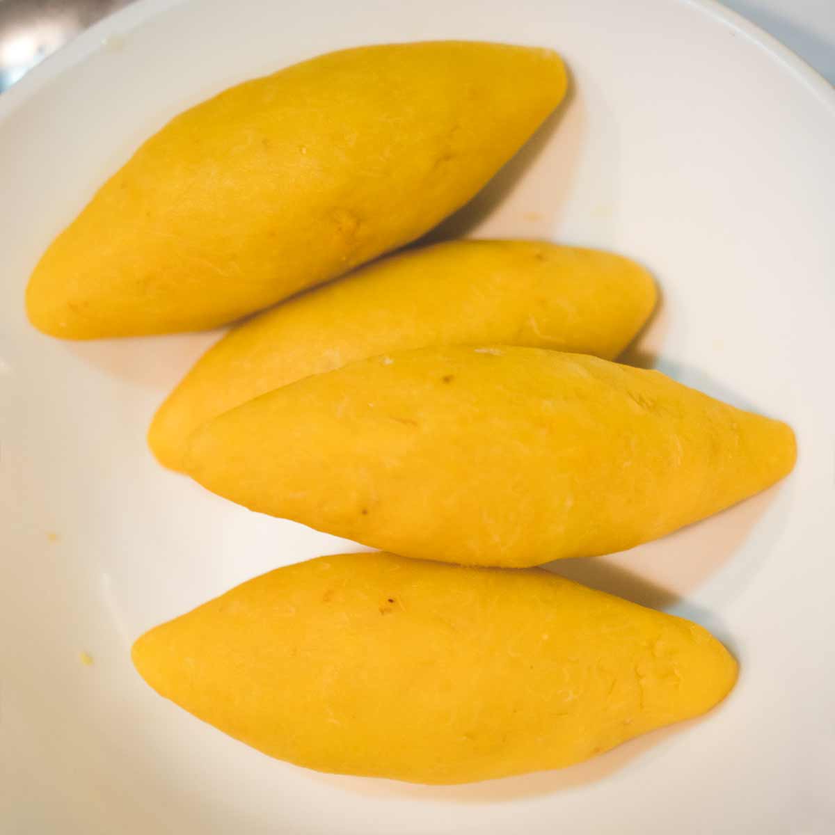 Unnakkai - Cotton Balls - Faces Places and Plates